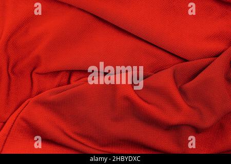 Saturated red color twisted fabric for texture background Stock Photo ...