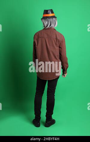 The senior Asian man dressing in Thanksgiving season color theme ...