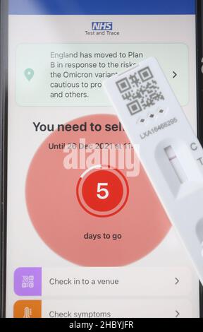 People do COVID-19 tests at the mobile test cabin on a street in ...