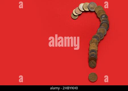 Question mark made of golden coins on red background Stock Photo - Alamy