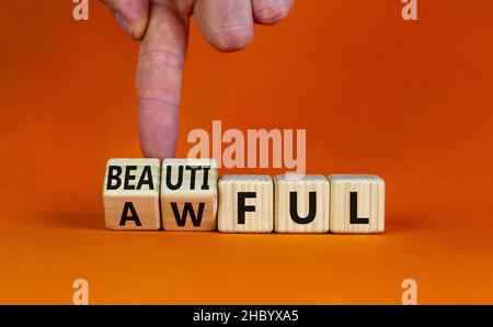 Beautiful or awful symbol. Businessman turns wooden cubes, changes the ...