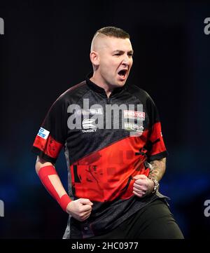 Nathan Aspinall in action against Michael van Gerwen in their quarter ...