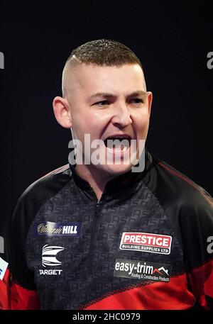 Nathan Aspinall in action against Rob Cross during night ten of the ...