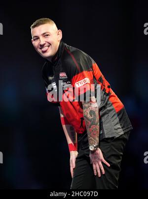 Nathan Aspinall in action against Luke Littler in the final during ...