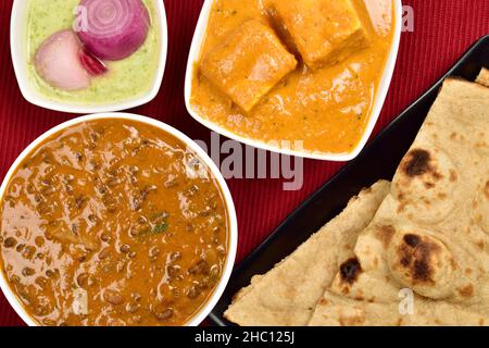 Paneer Butter Masala and Daal Makhani Served with Tandoori Roti in ...