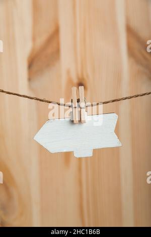 Arrow pointer hanging with clothespin on rope string peg, black ...