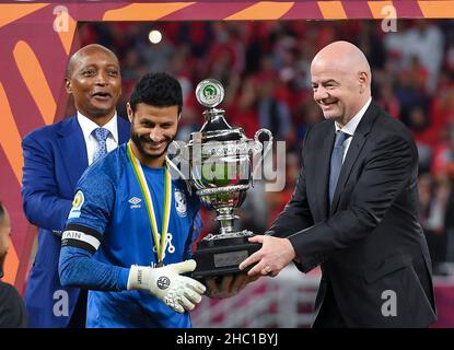 Al Ahly's goalkeeper Mohamed El Shenawy tips the ball over the bar too ...
