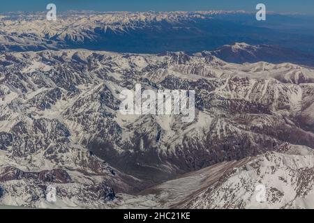 Aerial view of snow covered Tian Shan mountains in Kyrgyzstan Stock ...