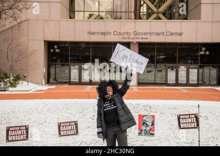 Ashley Dorelus of California protests outside the Hennepin County ...