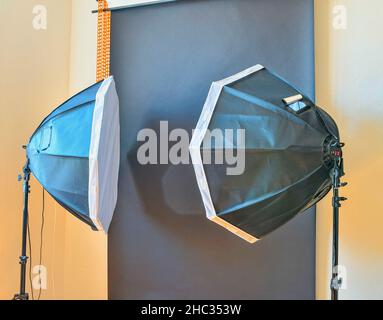 Empty photo studio with lighting equipment Stock Photo - Alamy