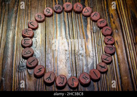 Runes carved from wood on the vintage wood background, Anglo-Saxons ...