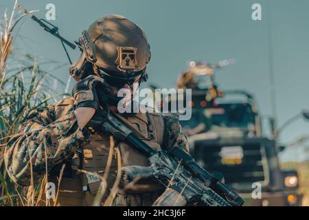 U.S. Marine Lance Cpl. Gage Kirkpatrick, a satellite transmissions ...