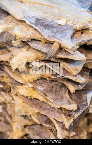 Pile of salted and dried cod Bacalhau fishes in Portugal Stock Photo ...