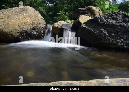 Kannimar Ootru - Triple Waterfalls and Natural Swimming Pools Stock ...