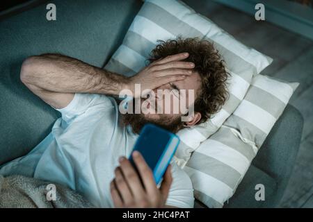 close up. man turns on the sound on his laptop Stock Photo - Alamy