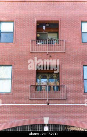 Vertical shot of a tall brick building Stock Photo - Alamy