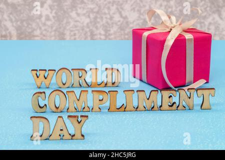 International Compliment Day. Banner with wooden letters. Holiday ...