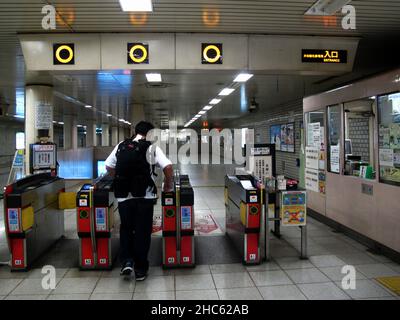 Japanese people and foreign travelers passenger wait and stand in queue ...