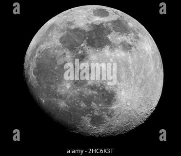 A grayscale shot of the full moon on a dark black background Stock ...