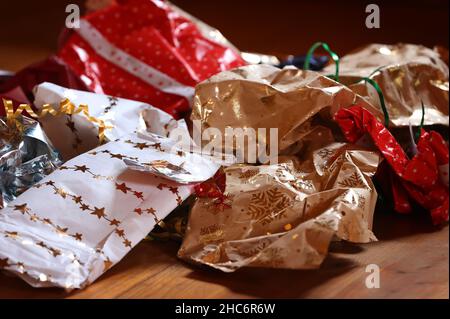 Unwrapped Christmas Presents Stock Photo - Alamy