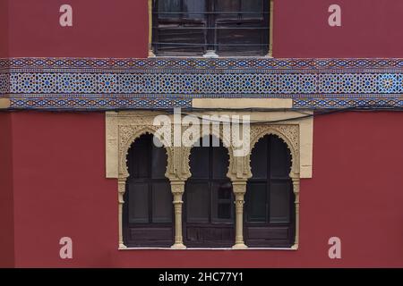 Detailed view of the exterior facade of a Moorish-style building ...