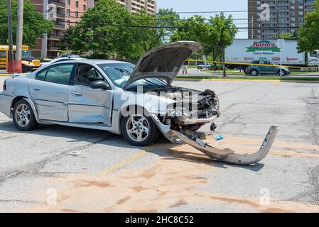 Crumpled and broken hoods of two collided cars after accident Stock ...