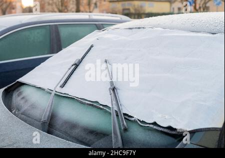 Car windshield covered with snow and frost on cold winter morning Stock ...