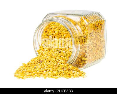 Bee Pollen Spilled from a Jar Stock Photo - Alamy