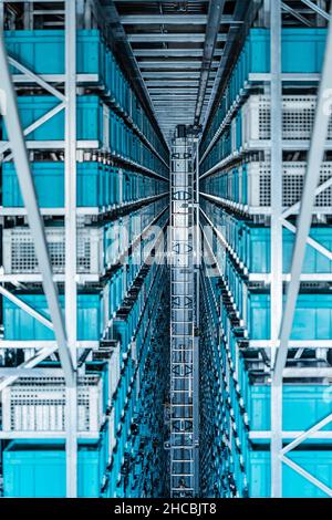 Vertical storage racks in a modern warehouse Stock Photo - Alamy
