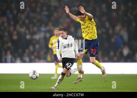 Derby County's Liam Thompson (left) and Norwich City's Marcelino Nunez ...