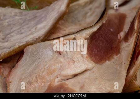Butcher cutting little pieces of fat pork meat Stock Photo - Alamy