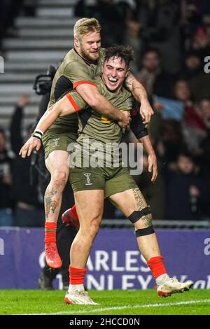 Harlequins' Tyrone Green (second left) is tackled by Gloucester's Jacob ...