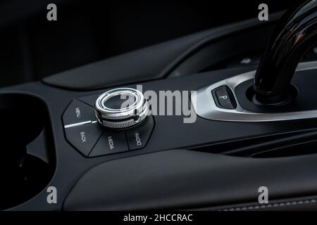 Modern car drive mode selector. Suspension and wheel drive control ...