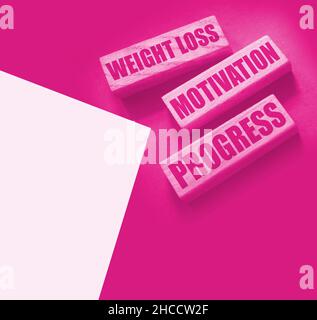 Weight loss motivation progress words on wooden blocks with copyspace ...