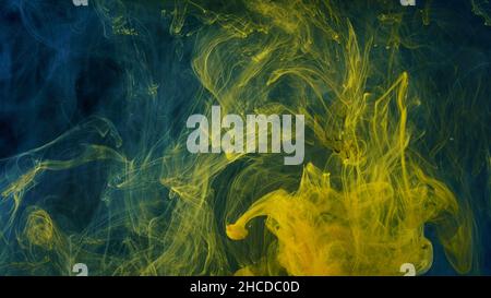 Ink water. Spreading paint clouds. Multicolor dye mixing. Art ...