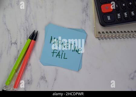 Marketing Fail write on sticky notes isolated on Wooden Table Stock ...