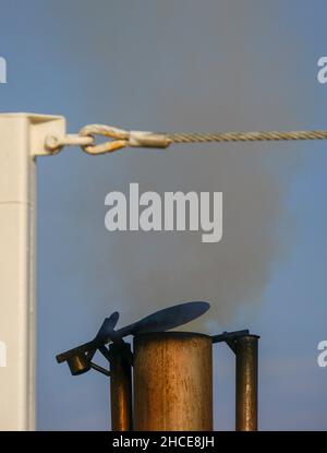 Exhaust emissions, burning marine diesel in a ships engine. Marine ...