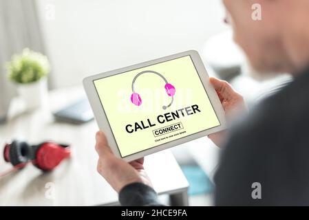 Tablet screen displaying a call center concept Stock Photo - Alamy