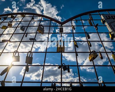 A low-key shot of the heart shape Christmas light decorations on a dark ...