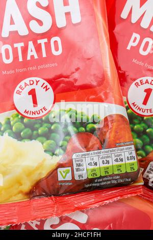 Plastic packet of ASDA supermarket own-label yellow popcorn kernels ...