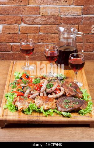 Grilled sausages with sauce and vegetables. Summer rest concept Stock ...