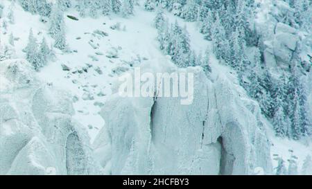 Snowy Rock in the forest. Video. snowy rocks in the mountains with ...