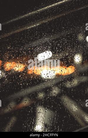A closeup shot of raindrops on the window on a rainy weather Stock ...