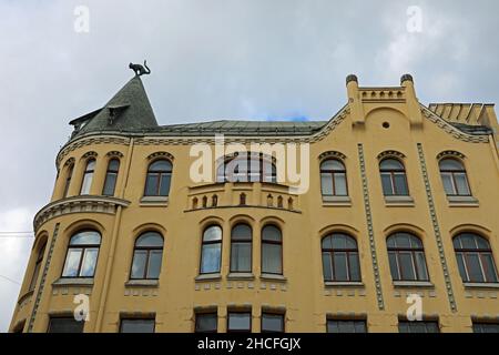 The famous Cat House built in 1909 with a cat sculpture on a rooftop in ...
