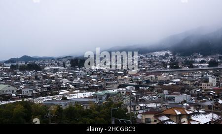 iida, nagano, japan, 2021-29-12 , view of rie fields covered with snow ...