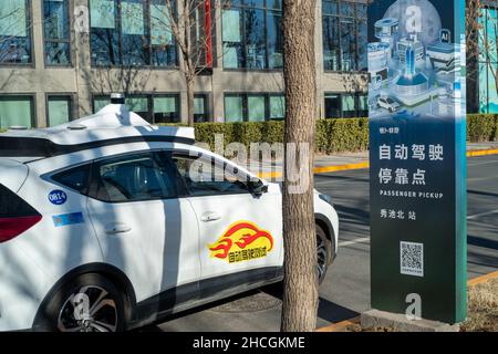 Self-driving car test vehicle with sticker identifying it as part of a ...