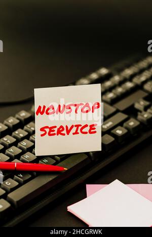 Hand writing sign Nonstop Service, Word Written on service that is ...