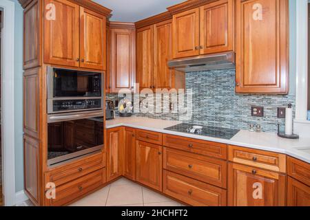 A traditional style kitchen in a residence at rural Chinese village ...