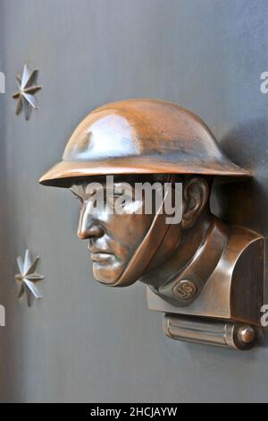 A small metal statue of a doughboy (American infantryman during World ...