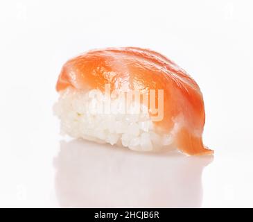 Single salmon nigiri sushi isolated on white background Stock Photo - Alamy